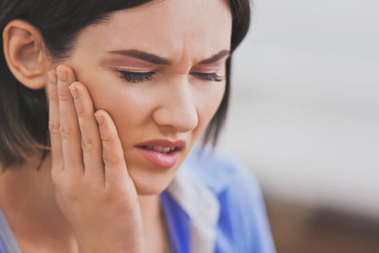 How Long Does Pain After Tooth Extraction Last? - Lane & Associates